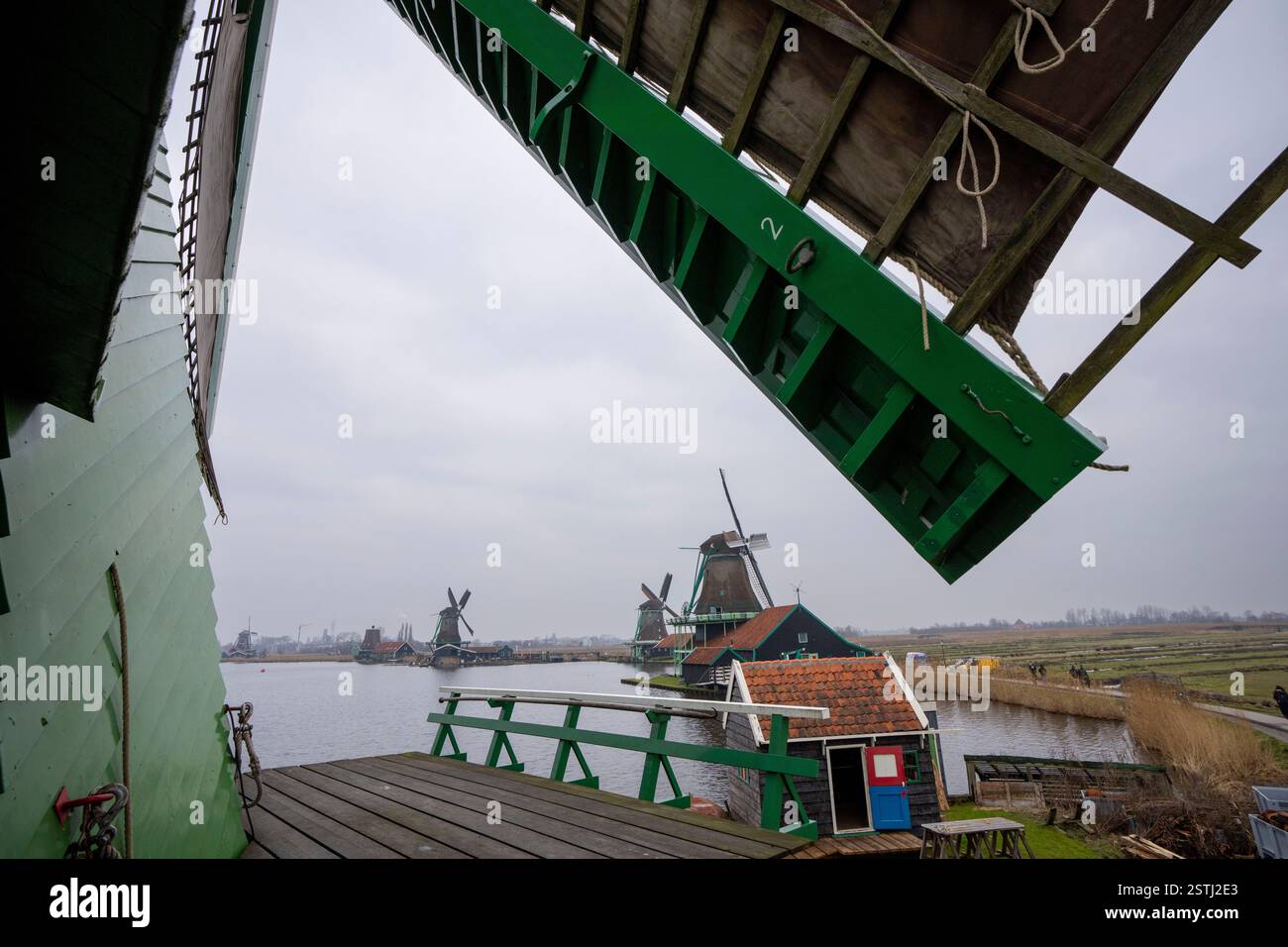 The giant sails of the centuries-old Gekroonde Poelenburg windmill ...