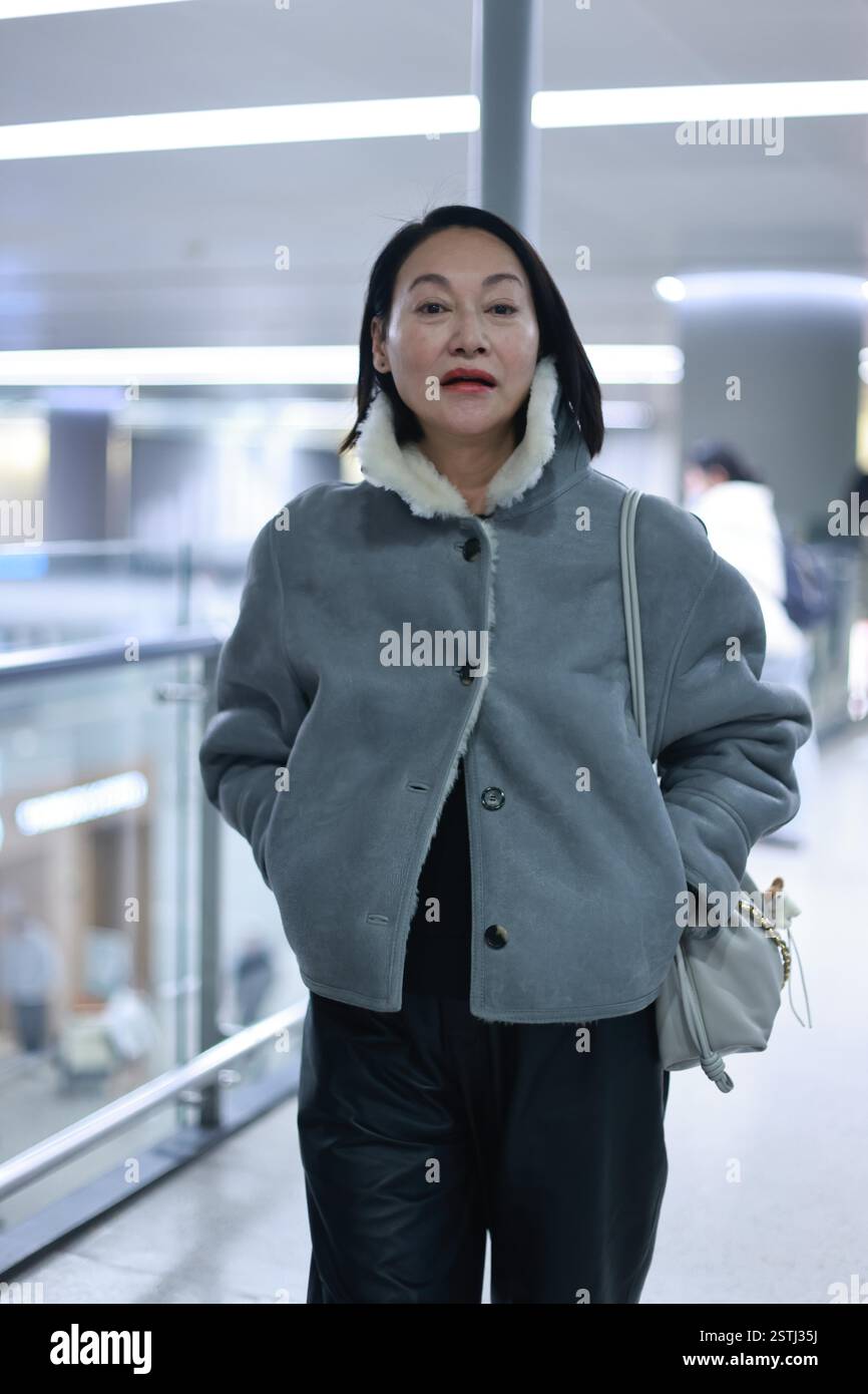 Hong Kong actress Kara Wai appears at the airport in Shanghai, China ...