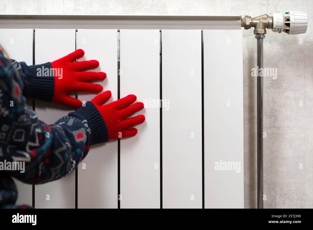 Family warms hands on heater hi-res stock photography and images - Alamy