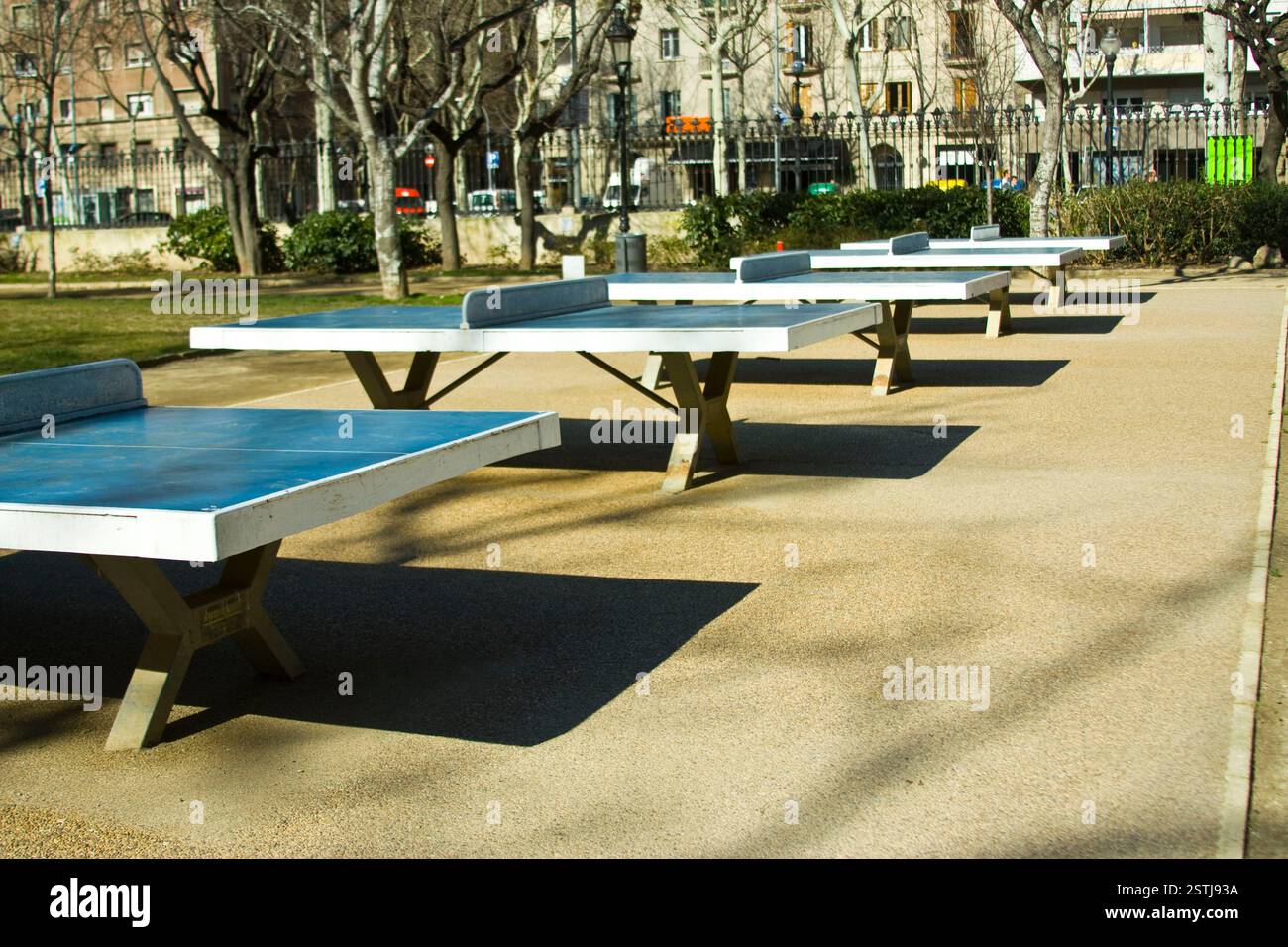 Outdoor ping pong tables in a park. Leisure activity, public space ...