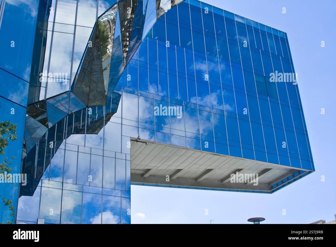 Architectural details of a glass building, showing the cantilevered ...