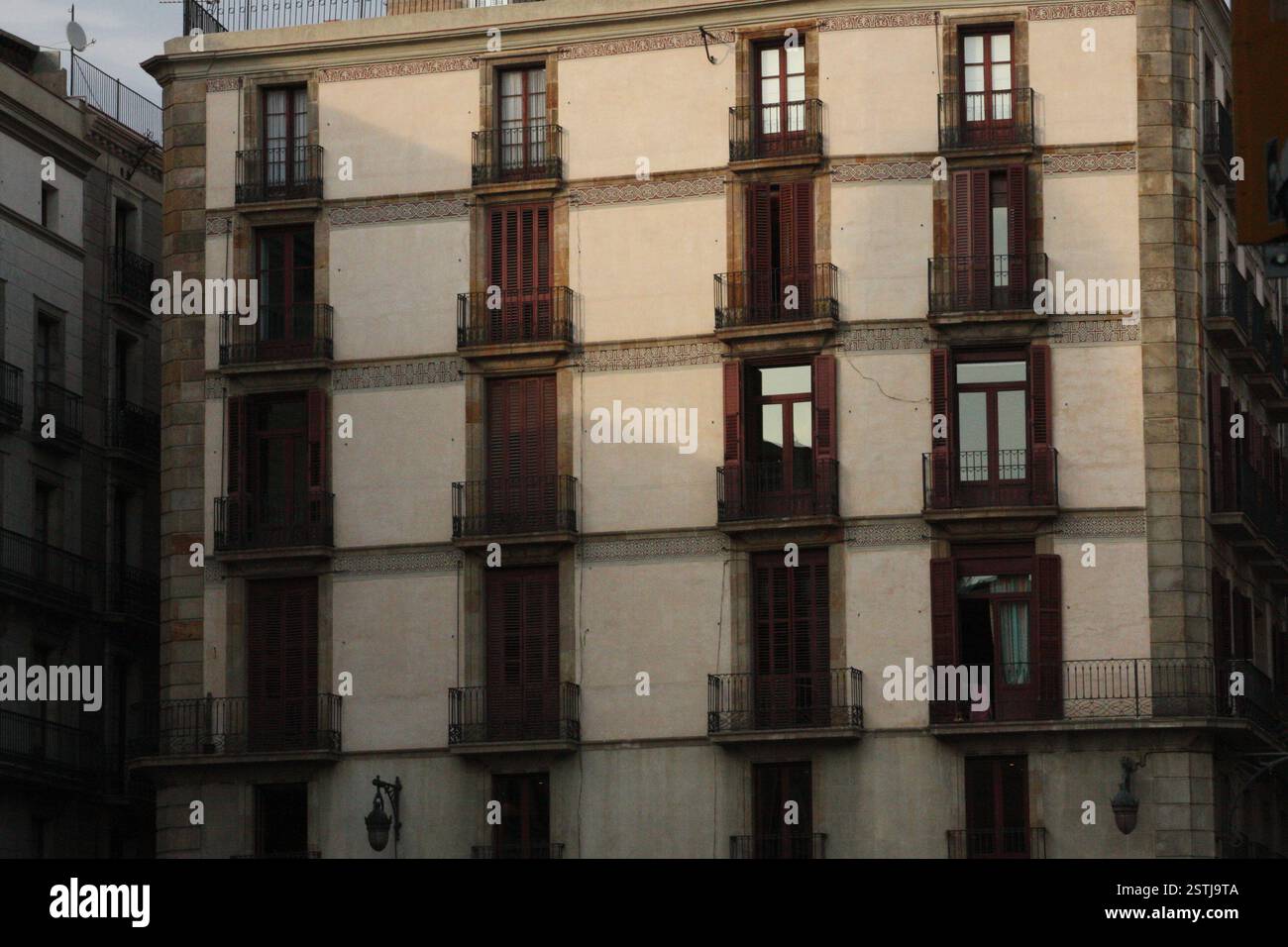 Building facade with repeating balconies and windows. Architectural ...