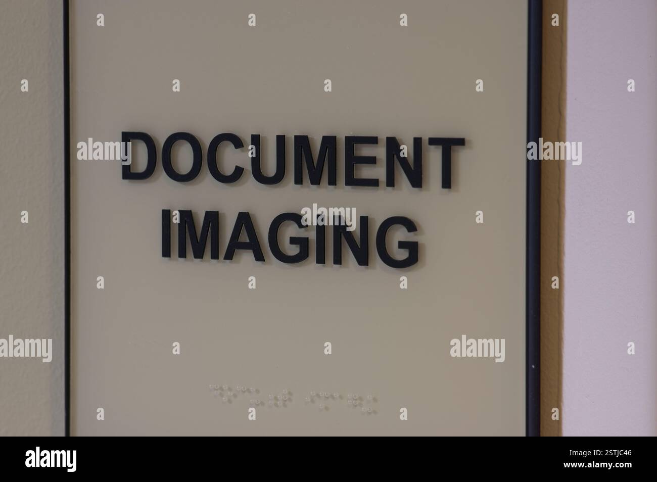 A sign for Document Imaging with braille Stock Photo - Alamy