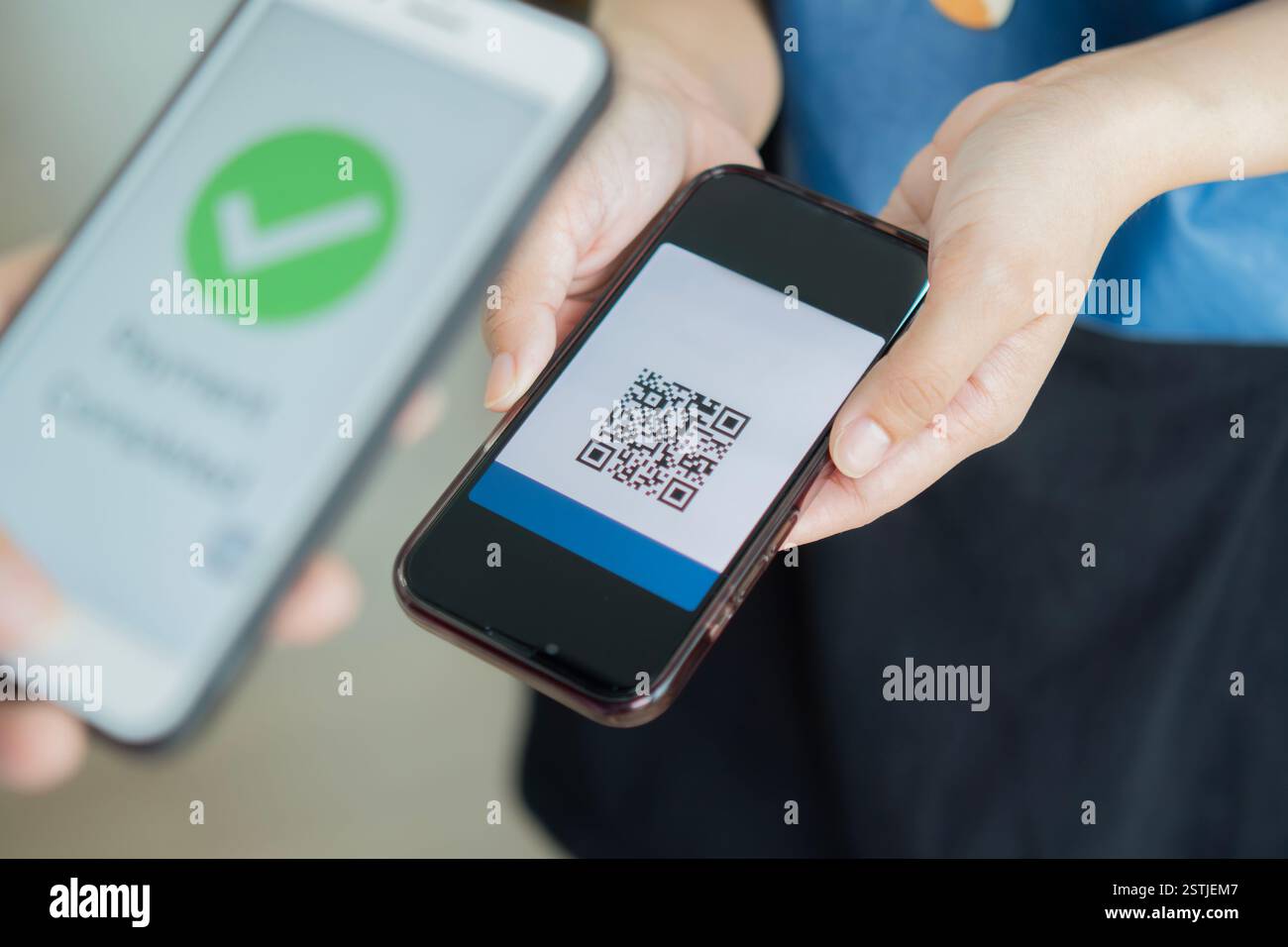 Selective focus of hand holding phone and scanning qr code. QR code ...