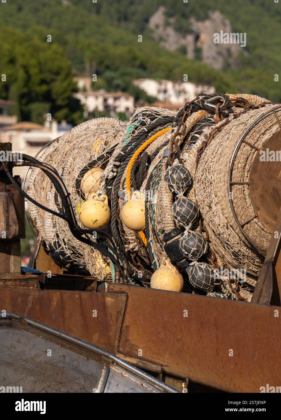 Close up neatly coiled fishing nets in Port de Soller harbor, showing ...