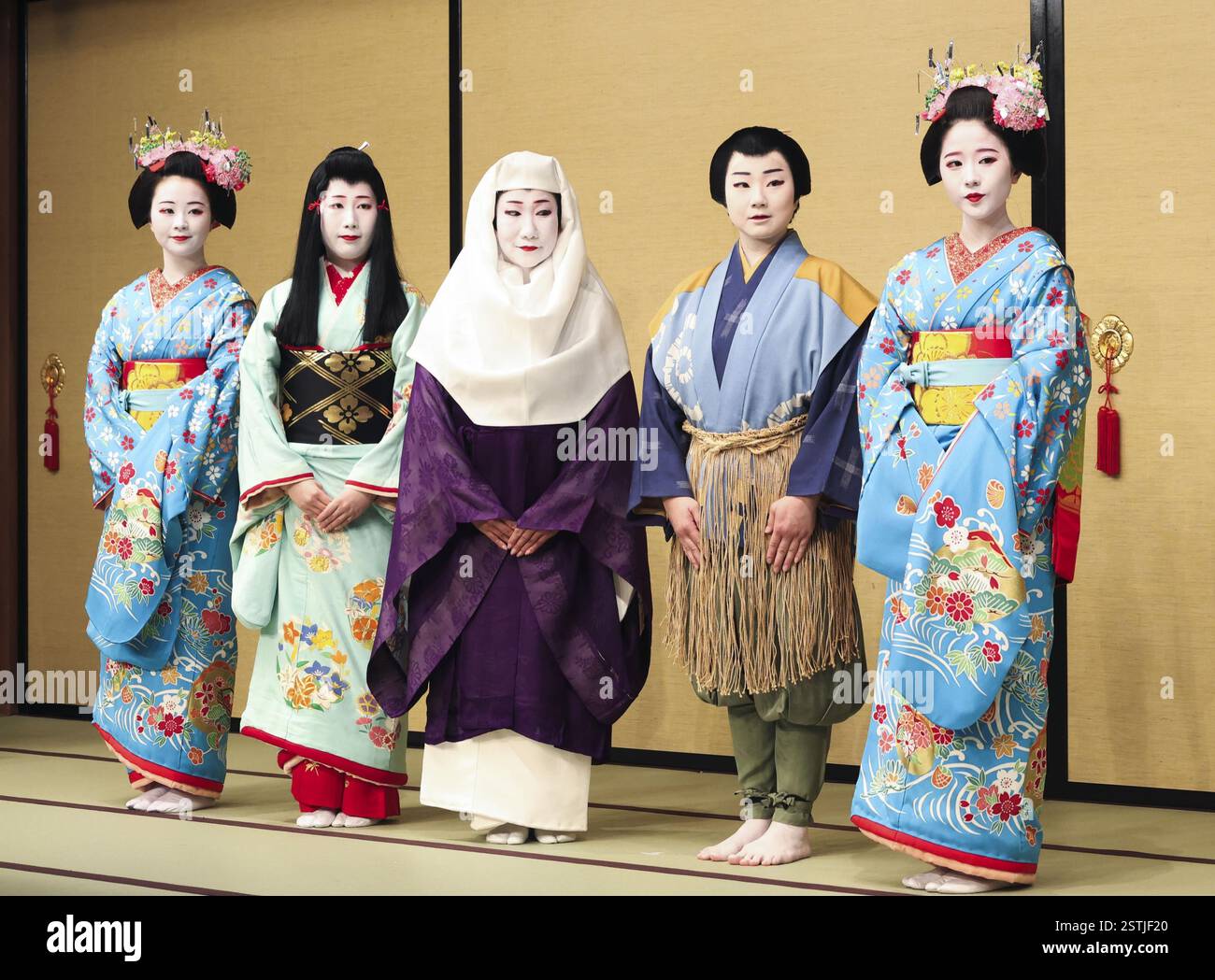Maiko and geiko traditional Japanese entertainers pose for a photo in ...