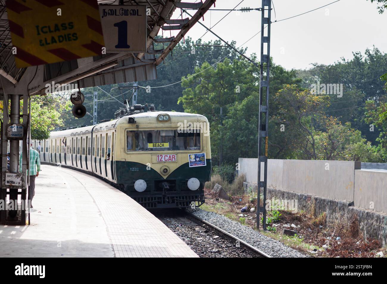 Train in India arriving at the Beach station in Chennai. Indian train ...