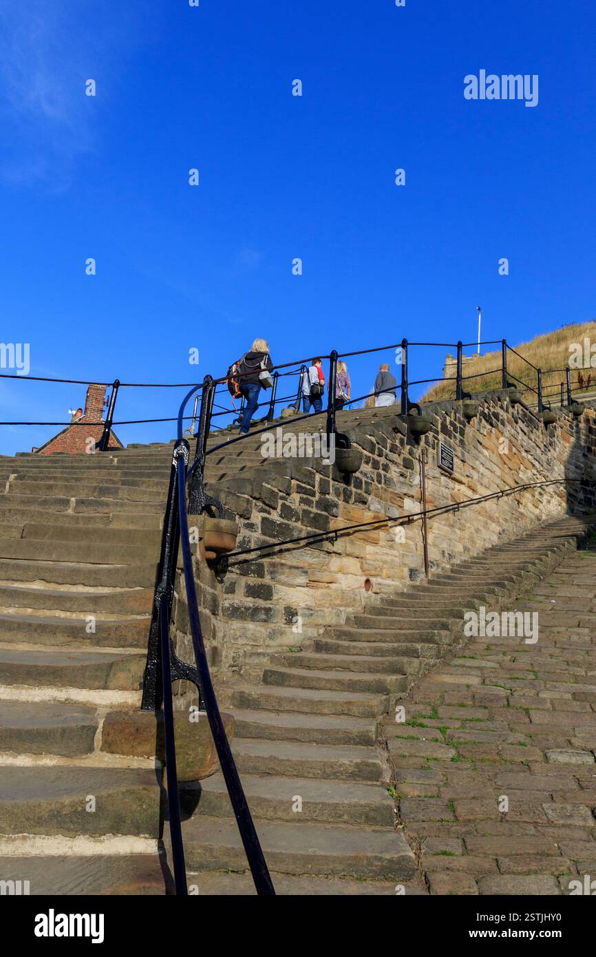 People walking the 199 steps whitby Stock Photo - Alamy
