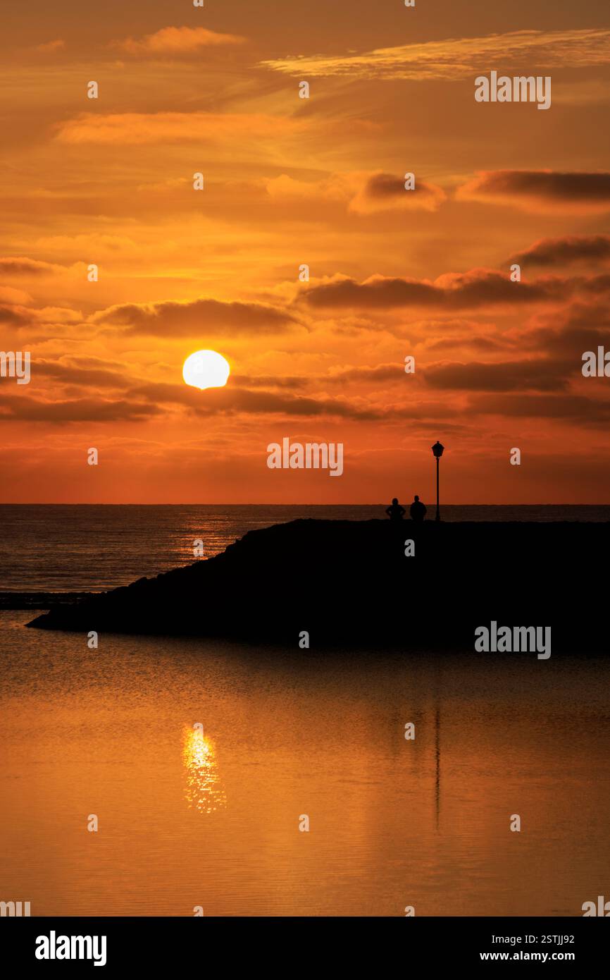 Sunrise silhouette Stock Photo - Alamy