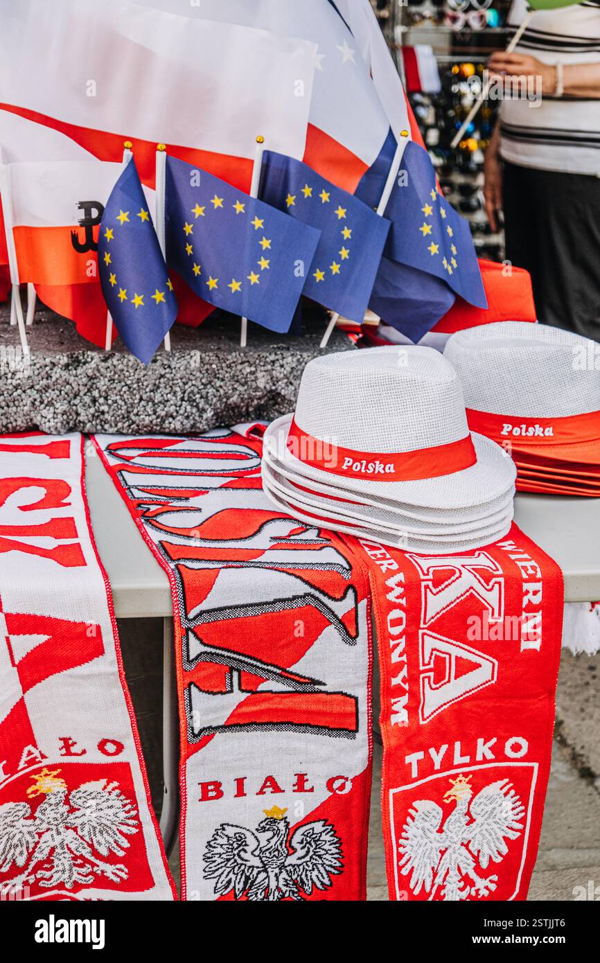Polish and European Union flags with white hats and scarves showcasing ...
