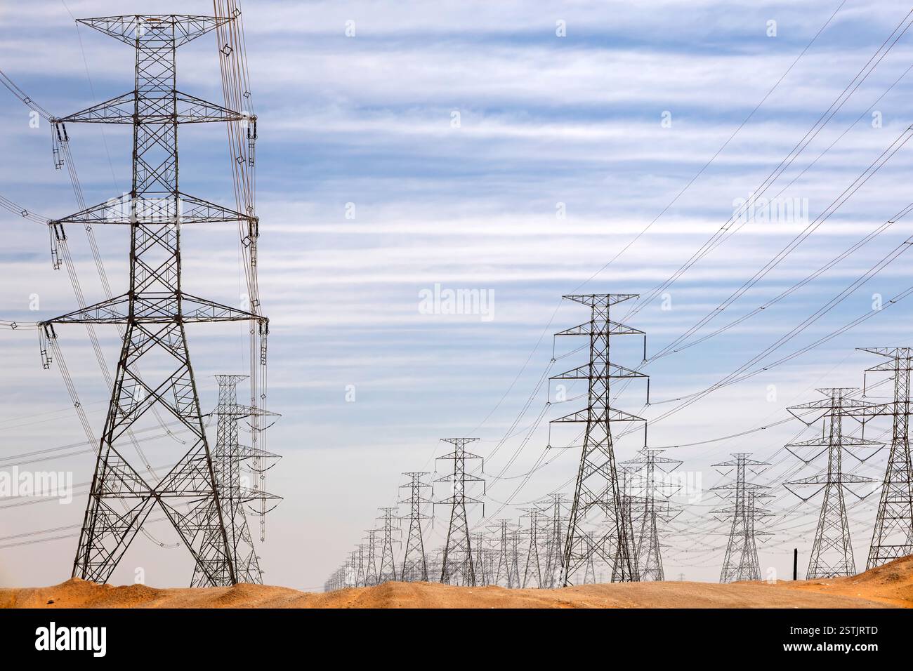 High-voltage power lines and high voltage electric transmission towers ...