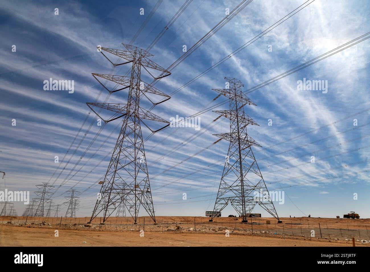 High-voltage power lines and high voltage electric transmission towers ...