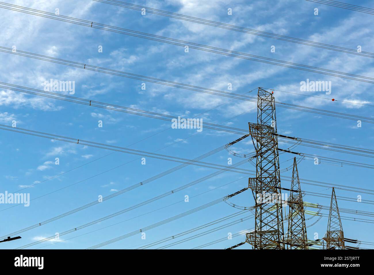 High-voltage power lines and high voltage electric transmission towers ...