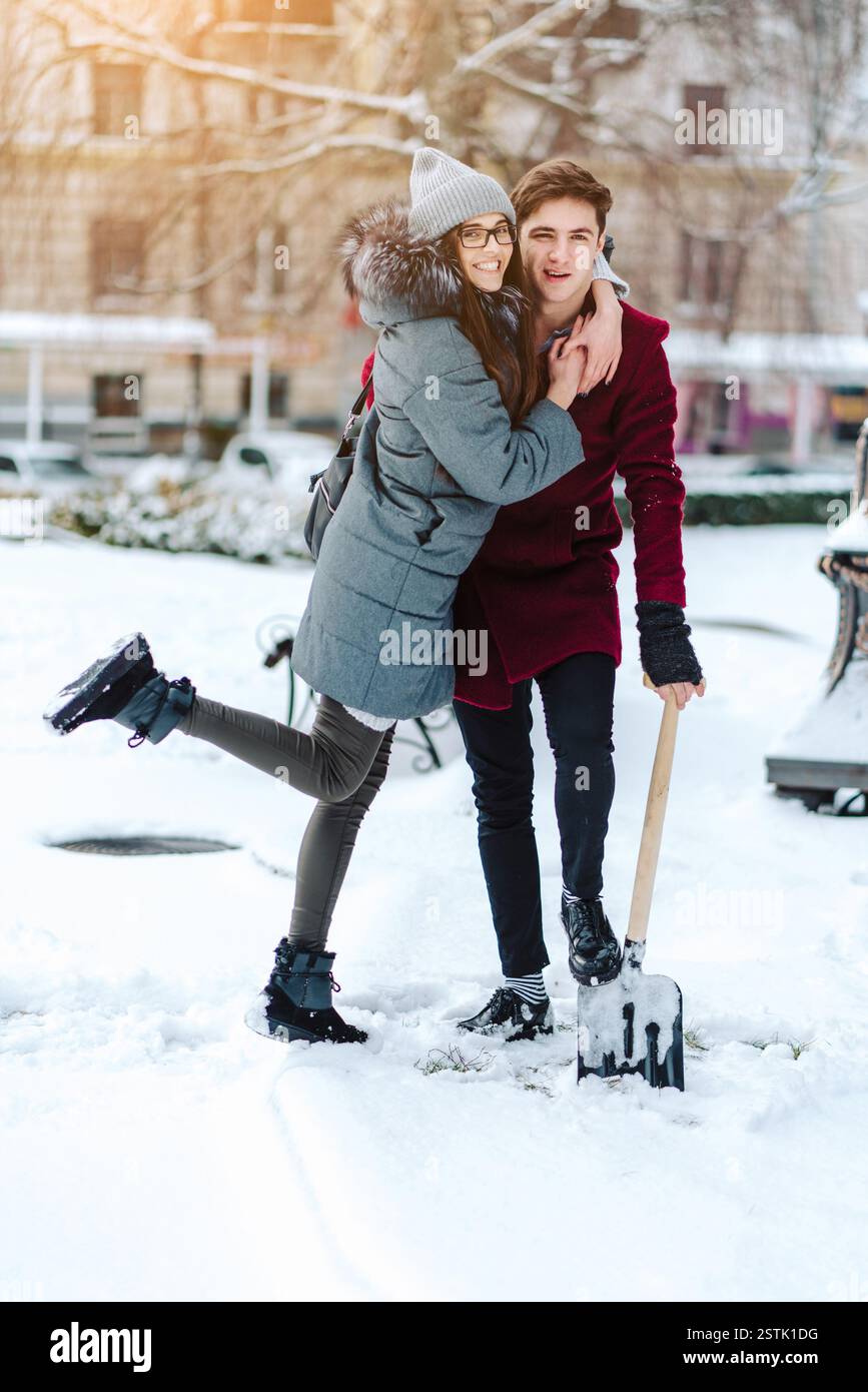Young couple in love outdoor. Portrait of Smiling Beauty Girl and her Handsome Boyfriend. Happy ...