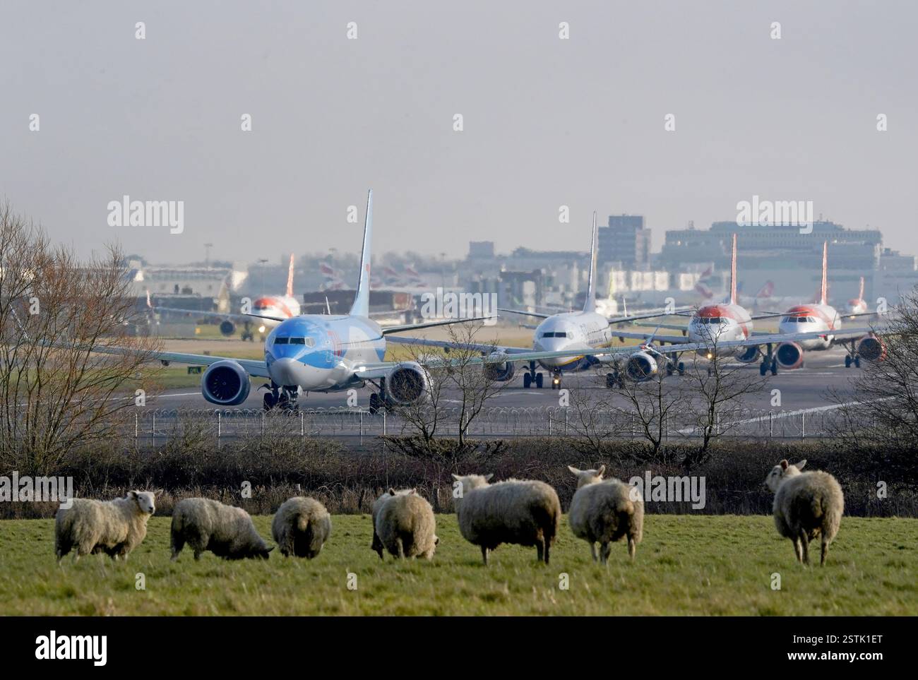 Planes queue for take off at London Gatwick Airport in Crawley, West Sussex. Gatwick wants to ...