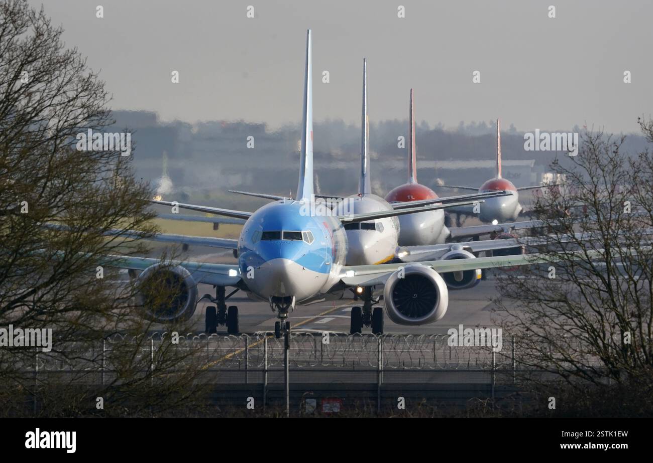 Planes queue for take off at London Gatwick Airport in Crawley, West Sussex. Gatwick wants to ...
