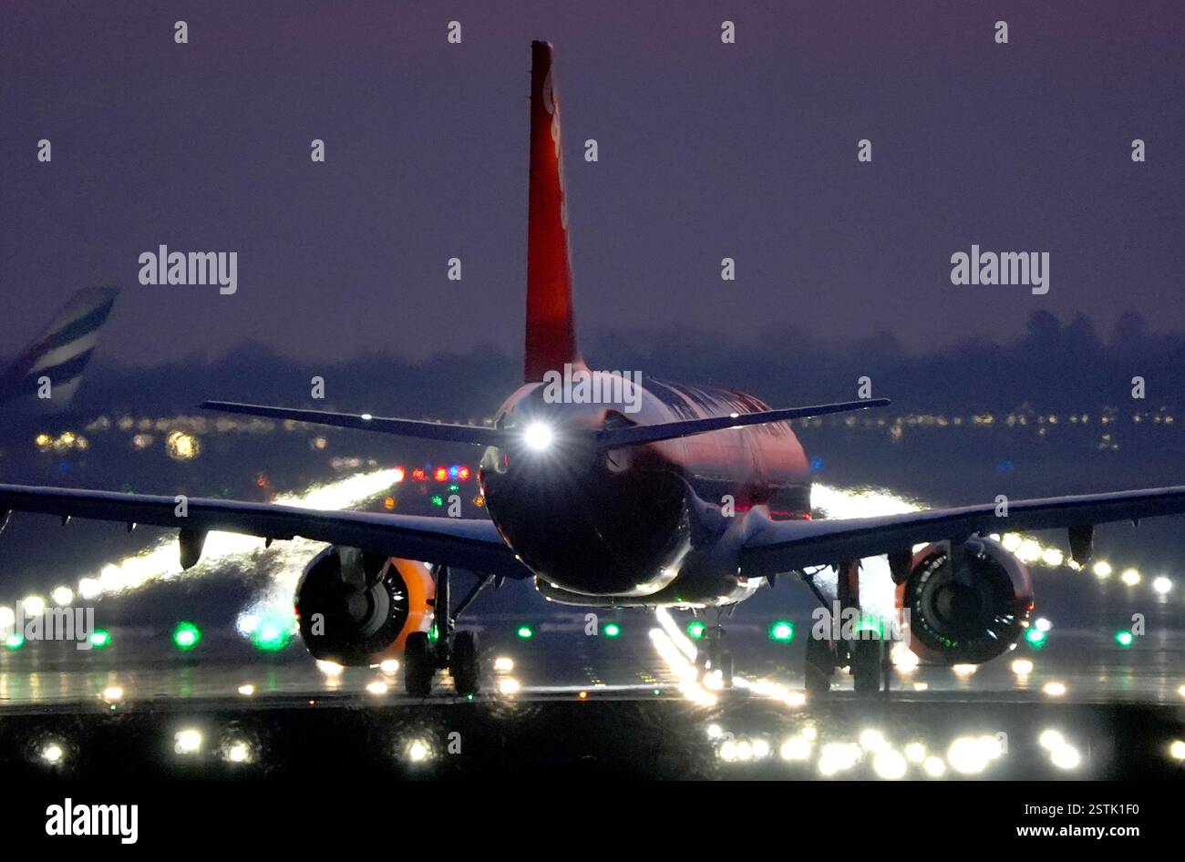 An EasyJet plane taxies before take off at London Gatwick Airport in ...