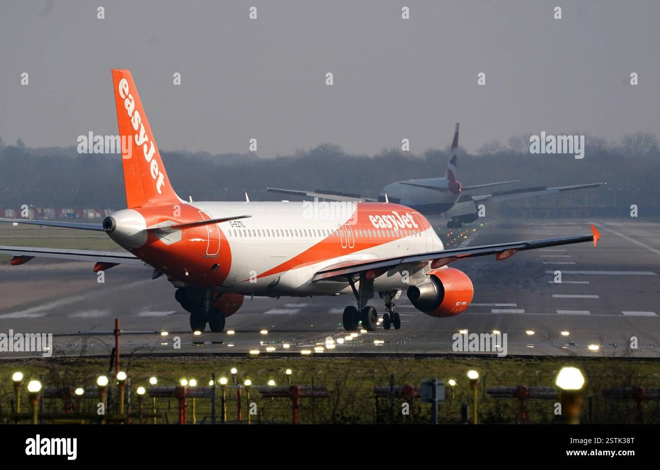 An EasyJet plane taxies before take off at London Gatwick Airport in ...