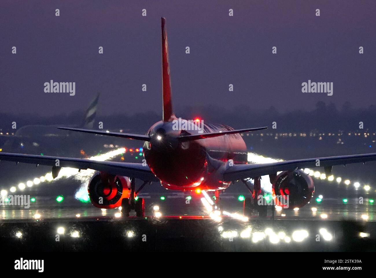 An EasyJet plane taxies before take off at London Gatwick Airport in ...