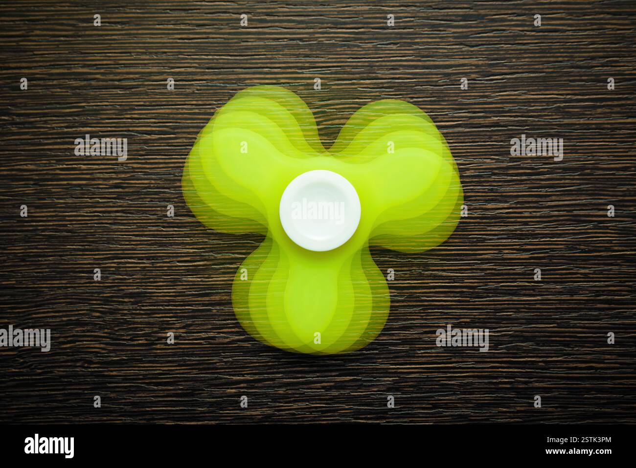 Fidget spinner spinning with stroboscopic effect Stock Photo - Alamy