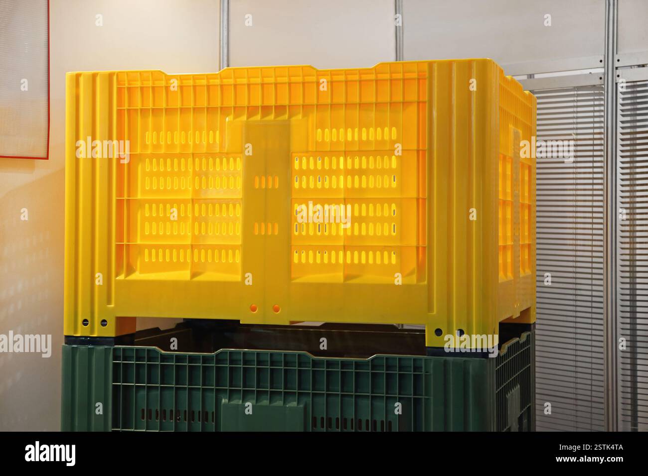 Yellow plastic pallet cargo container crate box hi-res stock ...