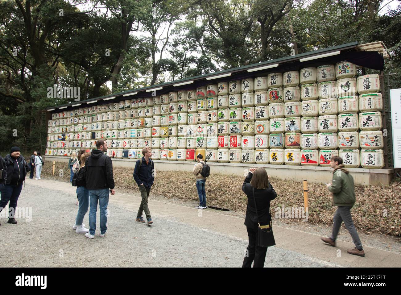 Tokyo, Japan, 5-4-2024:Stacked sake barrels, decorative kanji labels ...