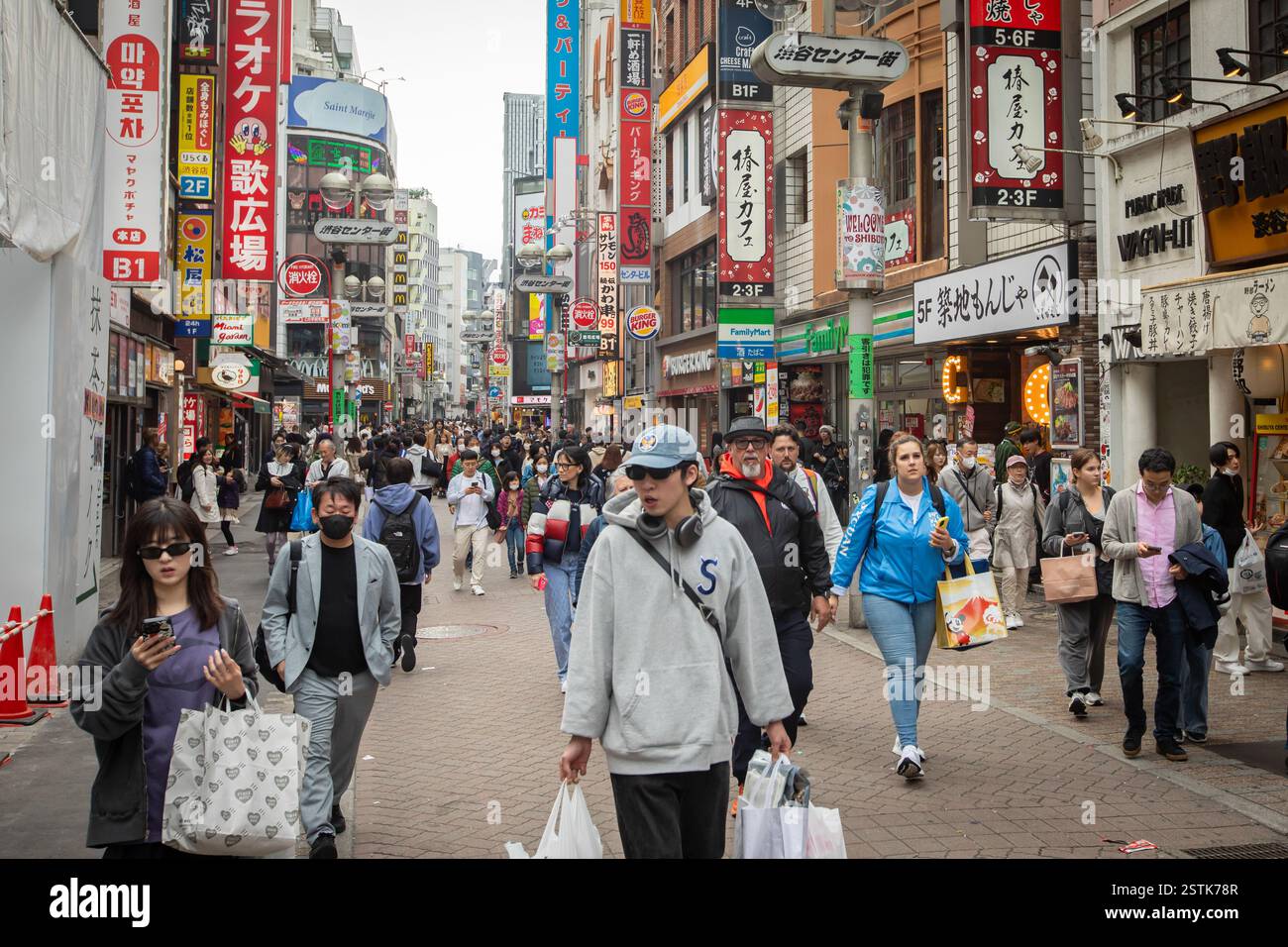 Tokyo, Japan, 5-4-2024: famous pedestrian Shibuya Crossing, neon lights ...