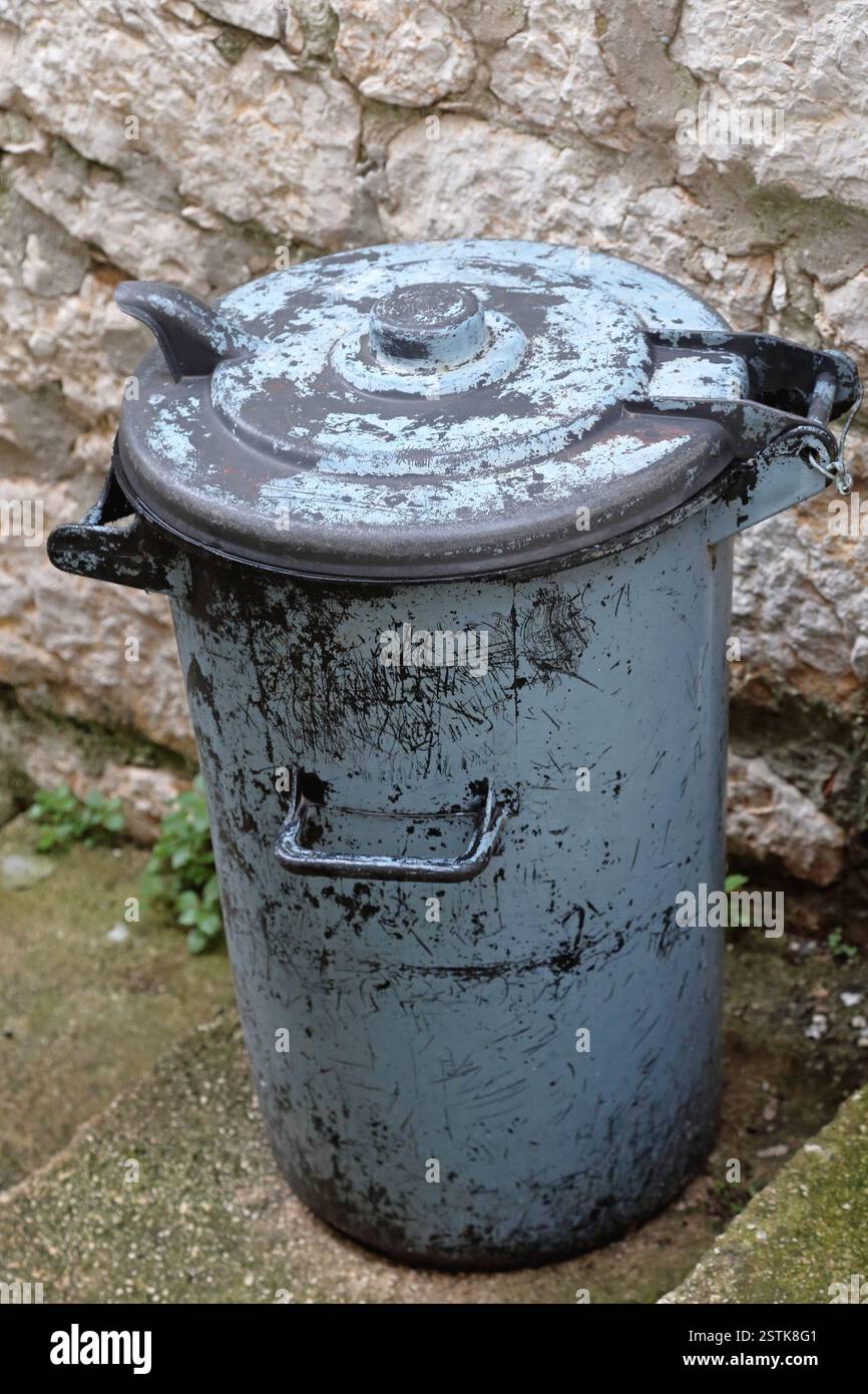 Retro style metal dust bin behind house hi-res stock photography and ...