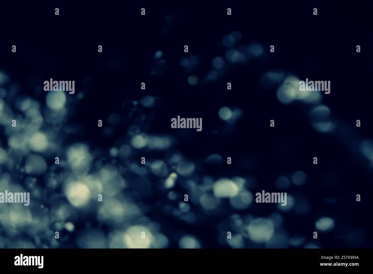 Defocused light spots of vintage teal color. Blurred water drops bokeh ...