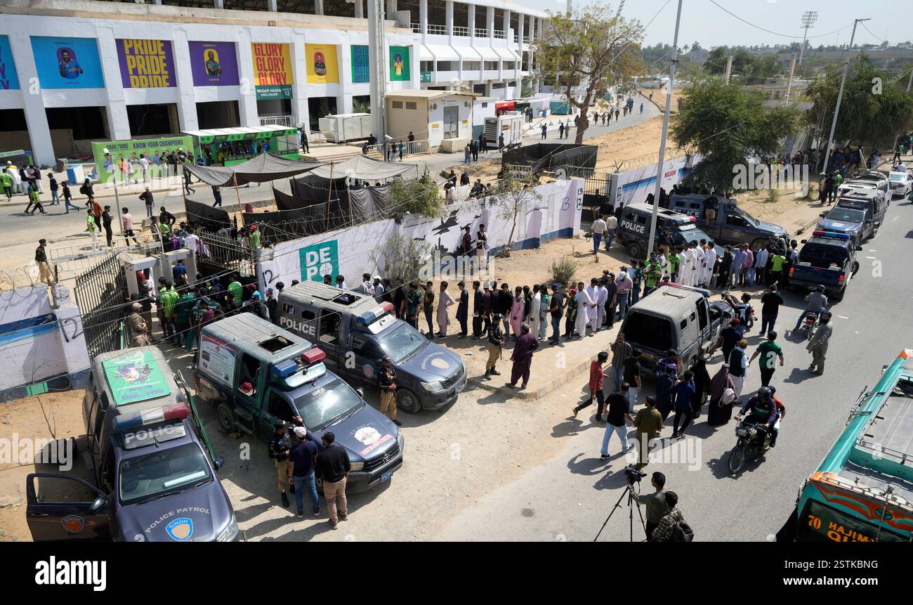 Fans pass through a security checkpoint to enter in the National Bank ...