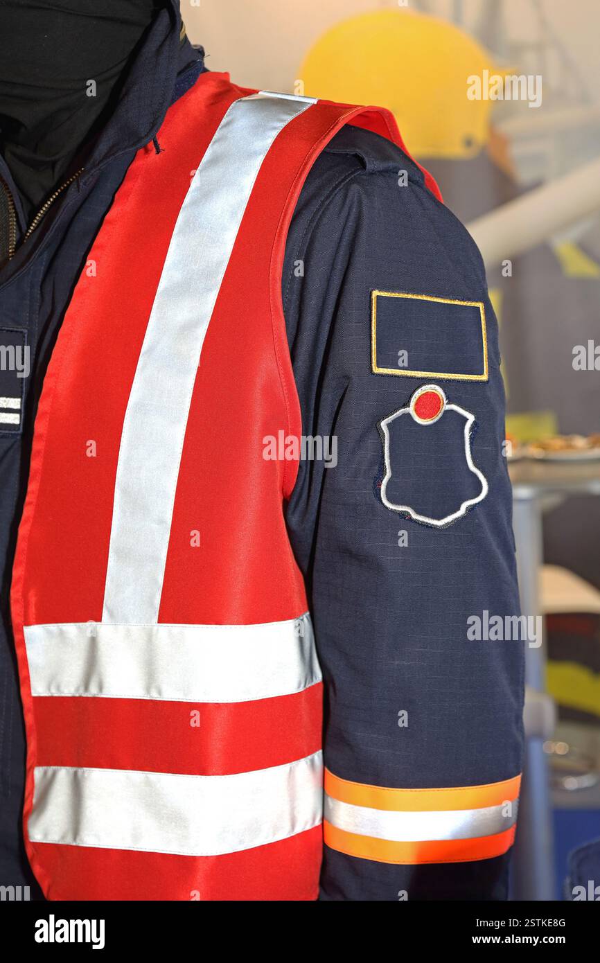 Red safety vest at man in uniform hi-res stock photography and images ...