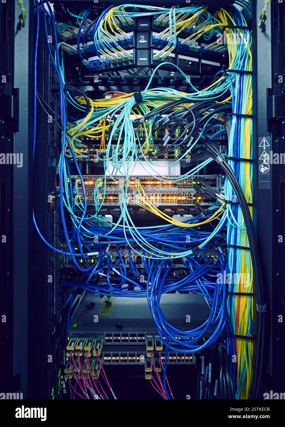 Close-up of hard drives and tangled cables in data center Stock Photo ...