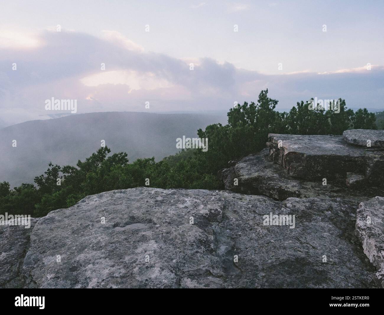 Peak above clouds on sunset hi-res stock photography and images - Alamy