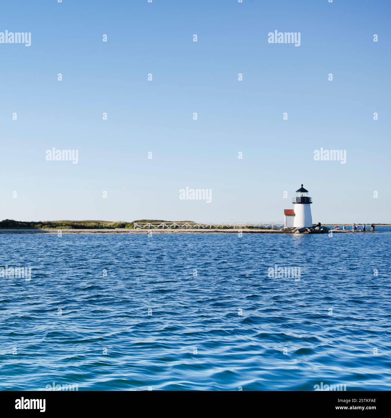 Brant Point Lighthouse and harbor with rippled water Stock Photo - Alamy