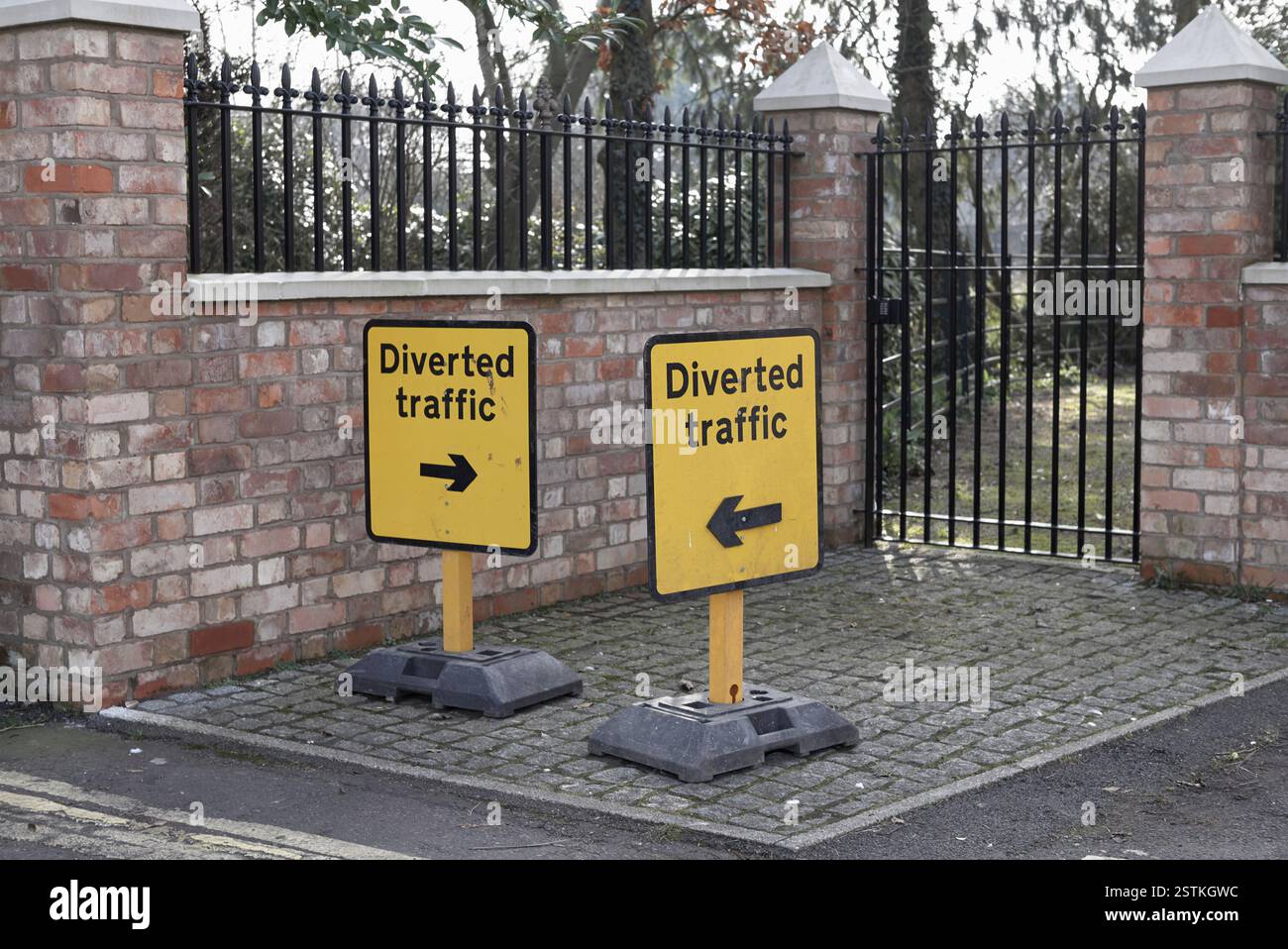 Confusing traffic signs pointing in two directions. England, UK Stock ...