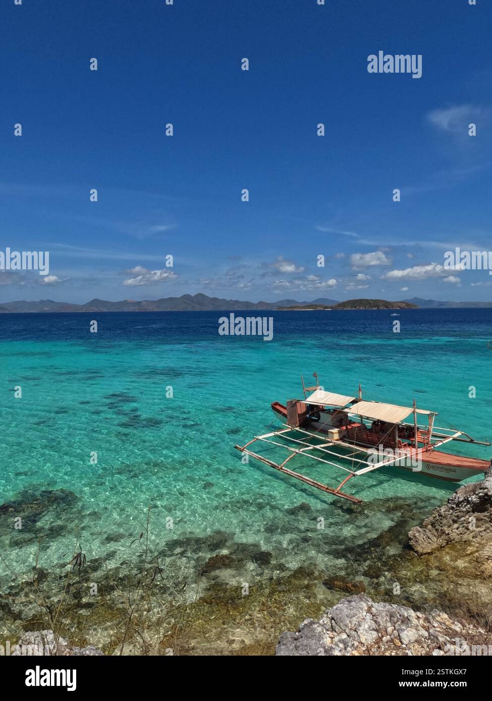 Traditional Boat on Turquoise Waters in Coron, Philippines Stock Photo ...