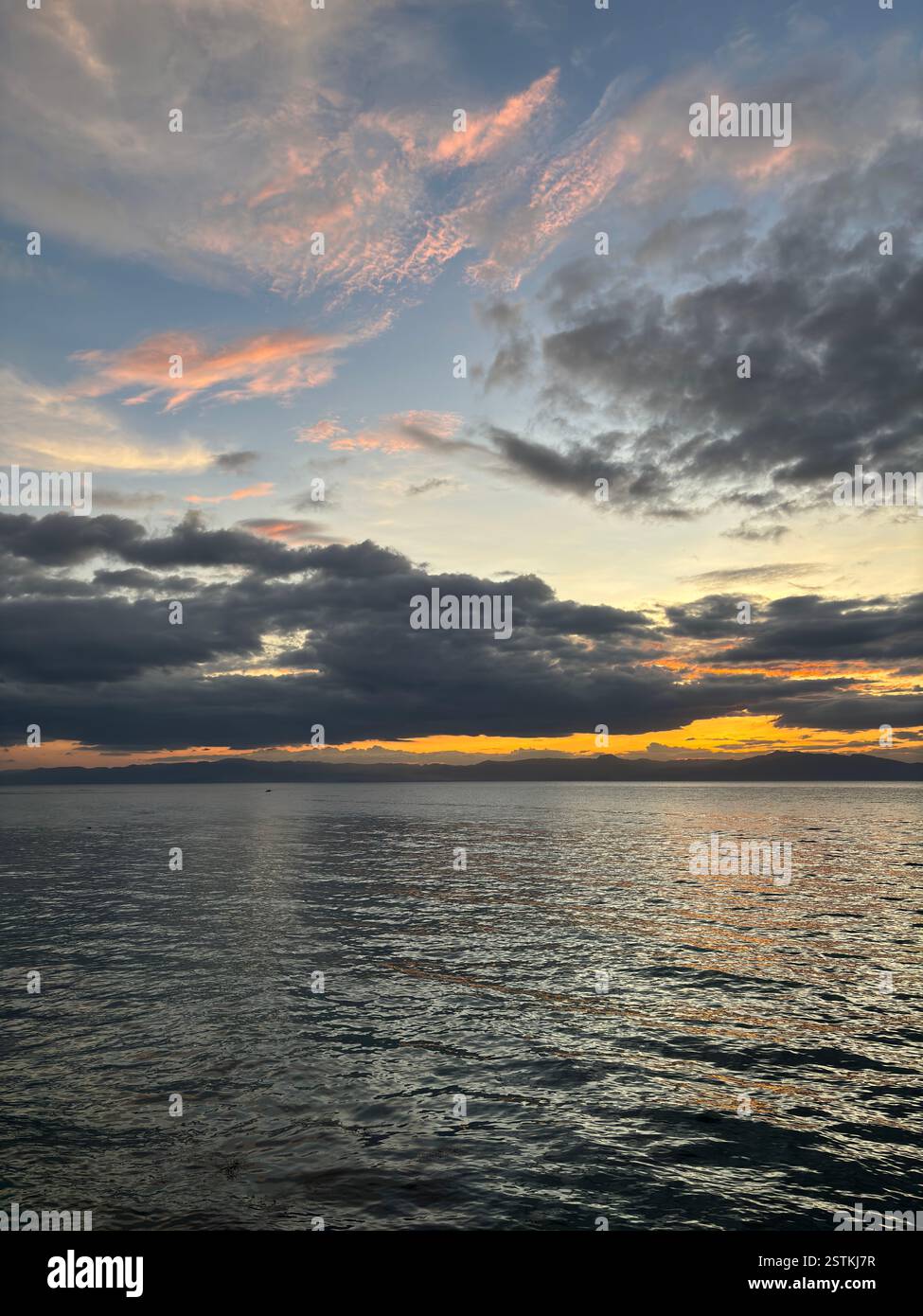 Spectacular Sunset Over the Philippine Sea with Vibrant Sky Reflections ...