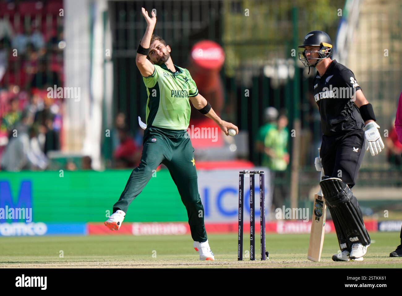 Pakistan's Shaheen Shah Afridi, left, bowls as New Zealand's Will Young watches during the ICC ...