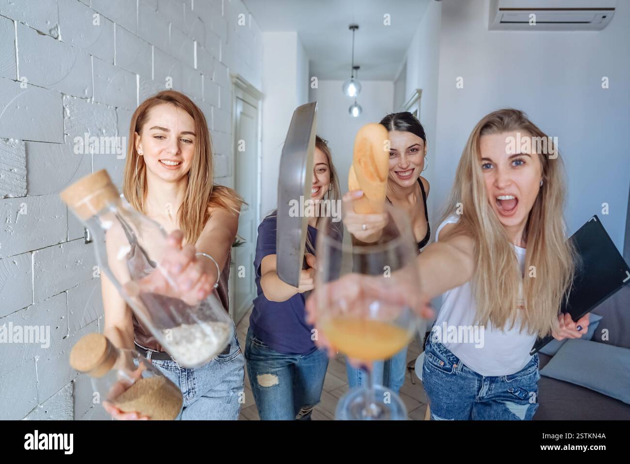Group of women in the kitchen Stock Photo - Alamy