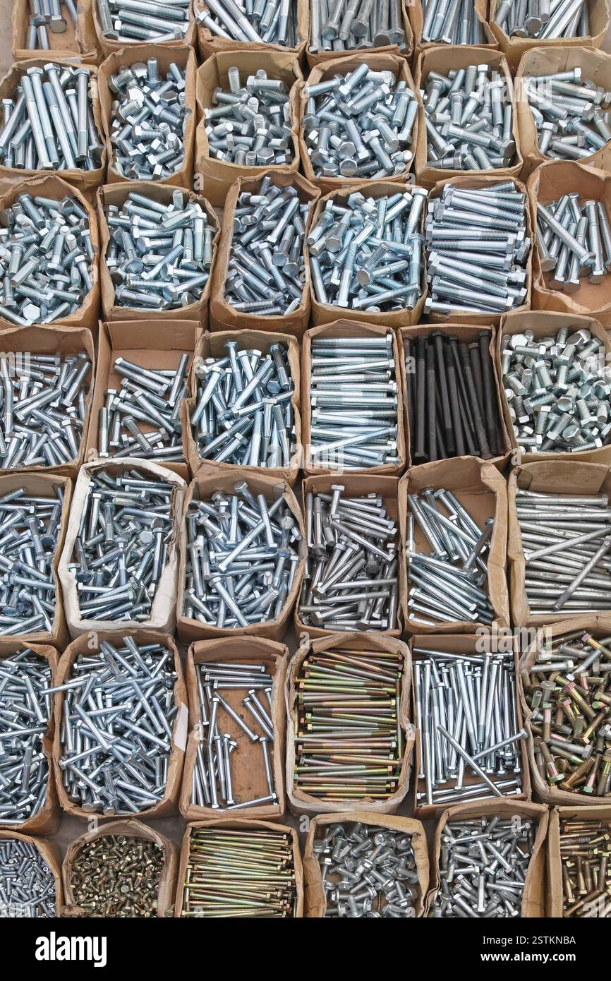 Various bolts and screws in boxes hi-res stock photography and images ...