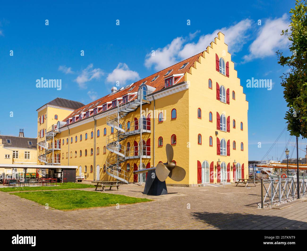 Historic yellow granary warehouse building now used as a medical center ...