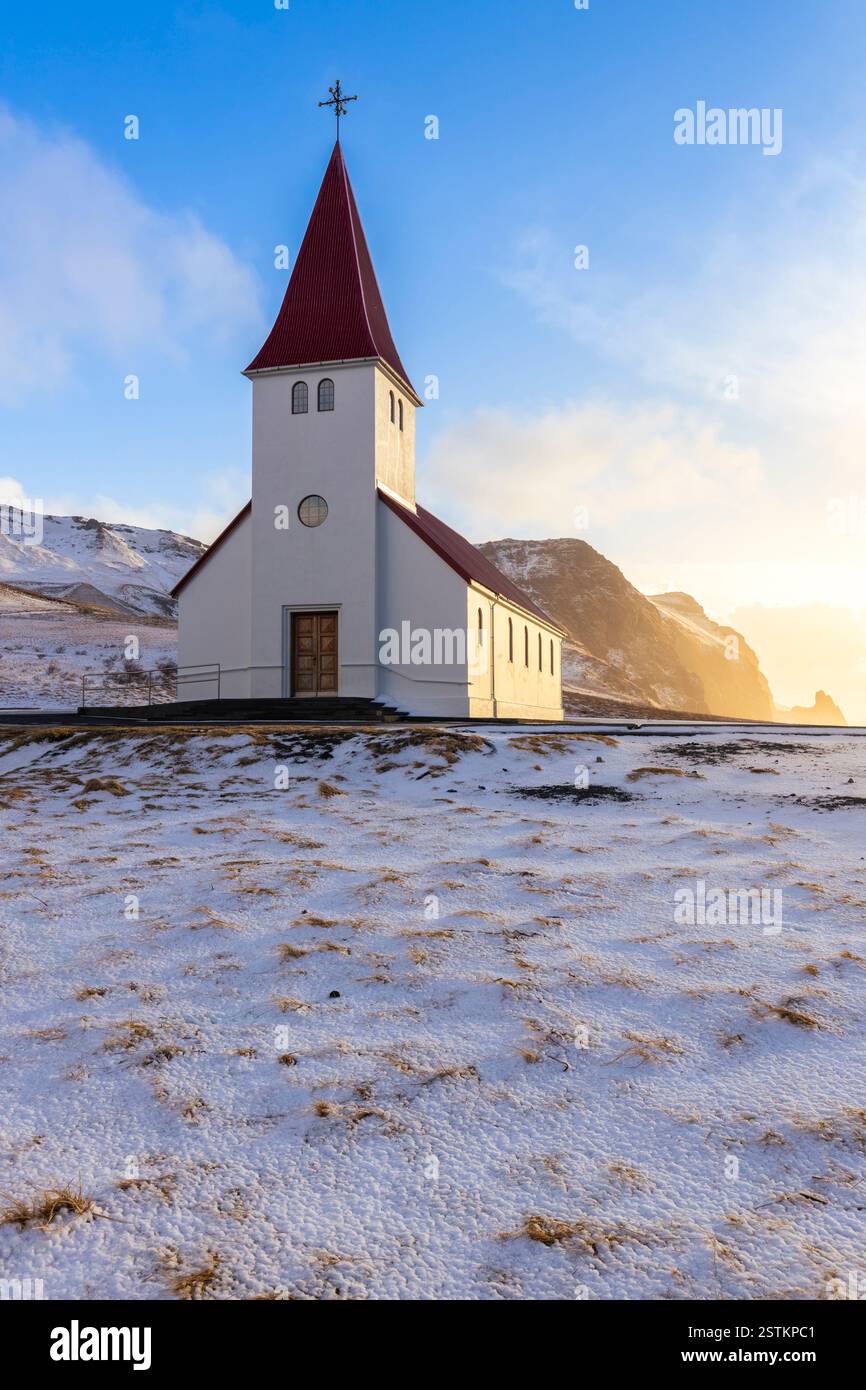 View of Víkurkirkja, Vik's church with red rooftop. Vik i Myrdal ...