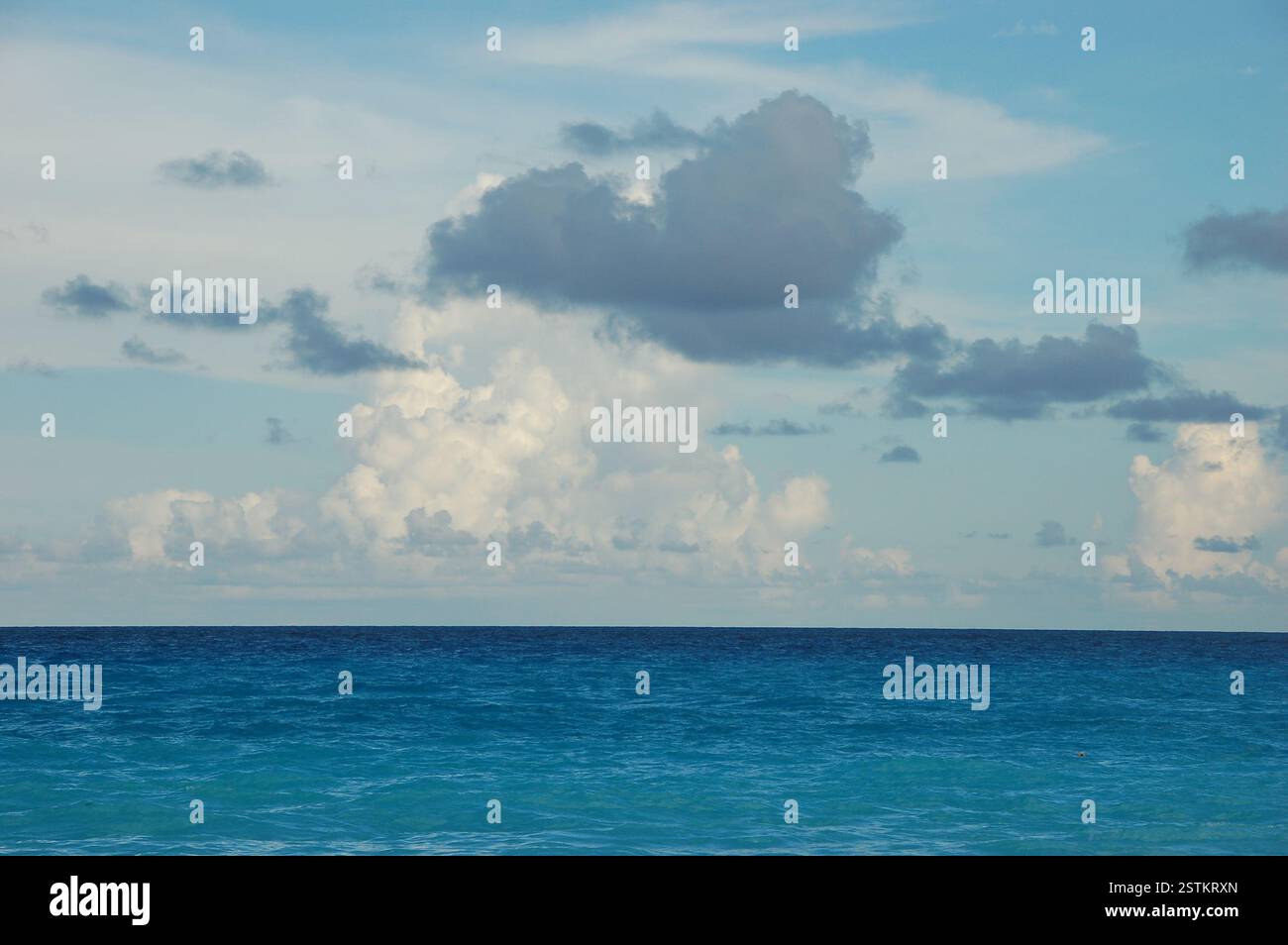 Stunningly beautiful blue beach in Cancun, Mexico but stormy clouds are ...