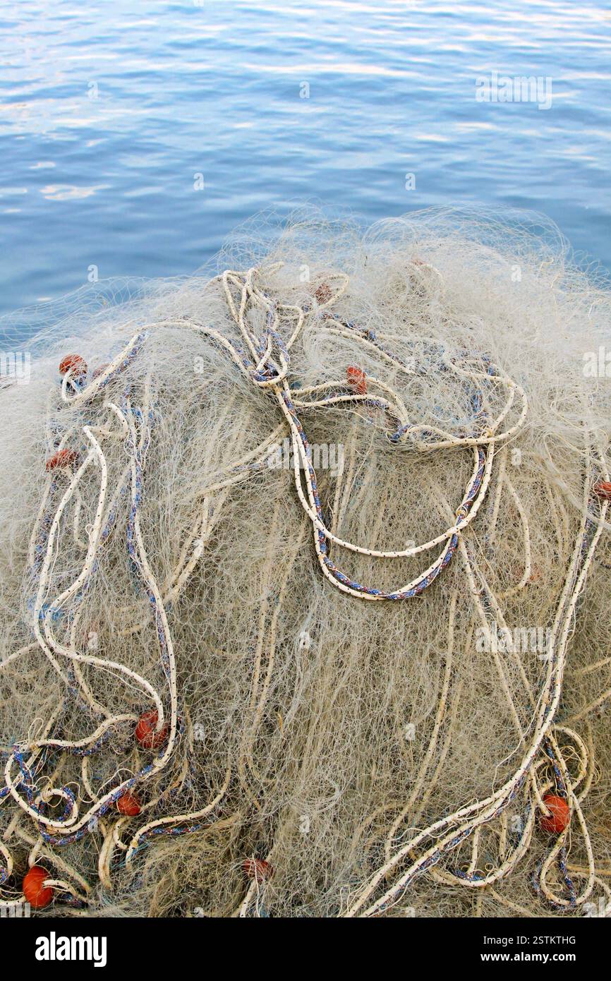 Big bunch of fishing net at seaside hi-res stock photography and images ...