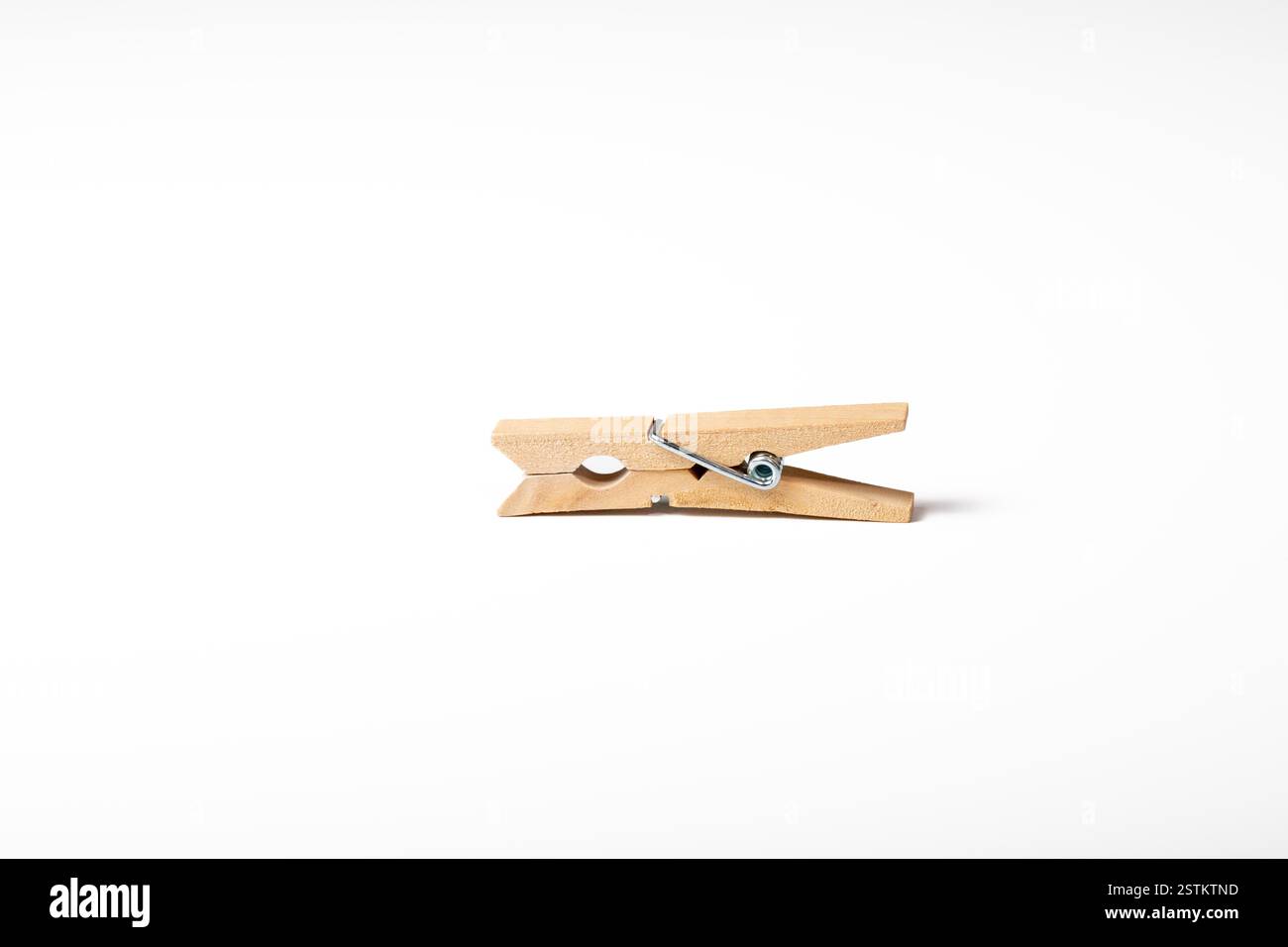 Wooden clothes peg isolated on white background Stock Photo - Alamy