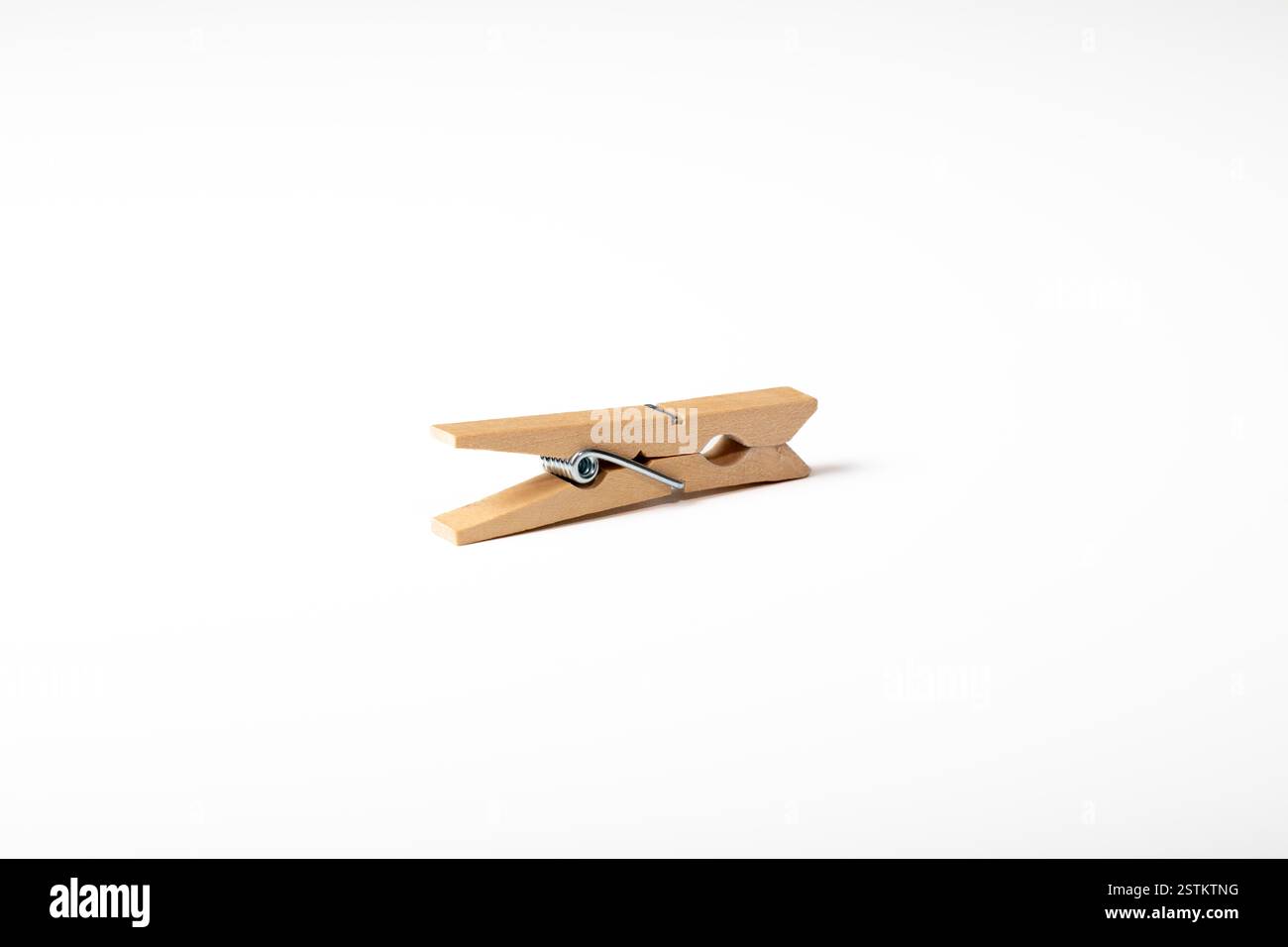 Wooden clothes peg isolated on white background Stock Photo - Alamy