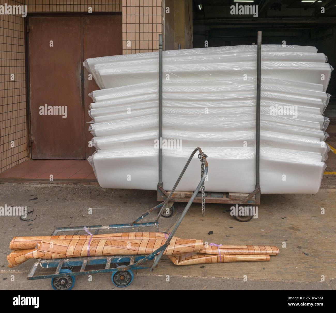 Construction material at cart in front of hardware store hi-res stock ...