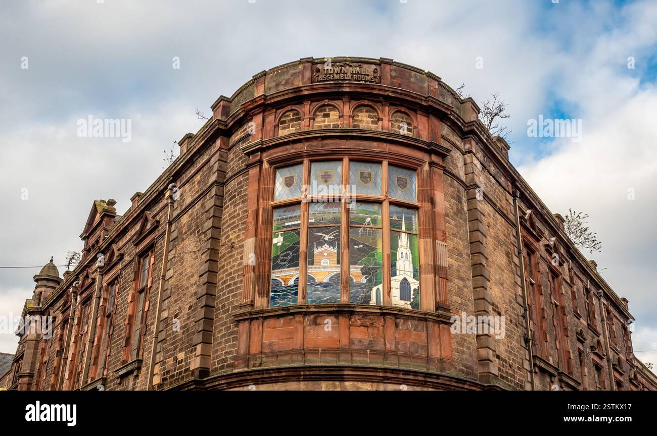 Stained glass window and carved sign with the inscription ‘Town Hall ...