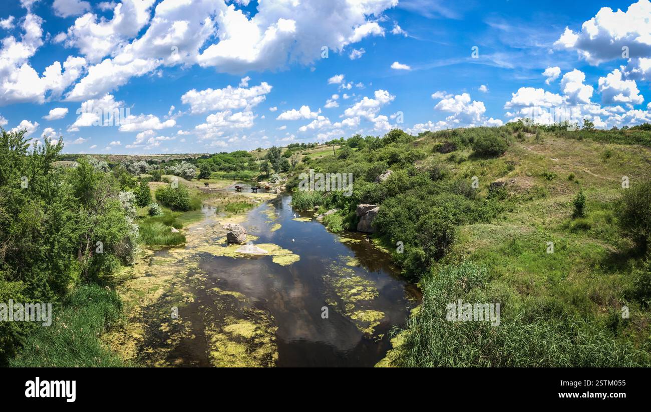 River in Aktovsky canyon, Ukraine. Big rocks in small river and calm ...