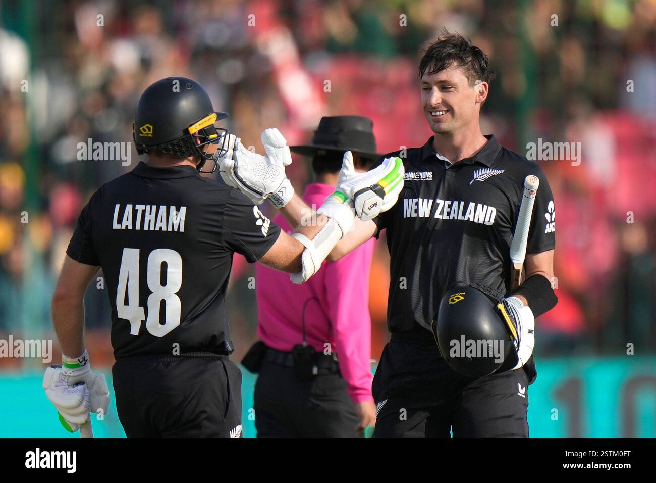 New Zealand's Will Young, right, celebrates with Tom Latham after ...